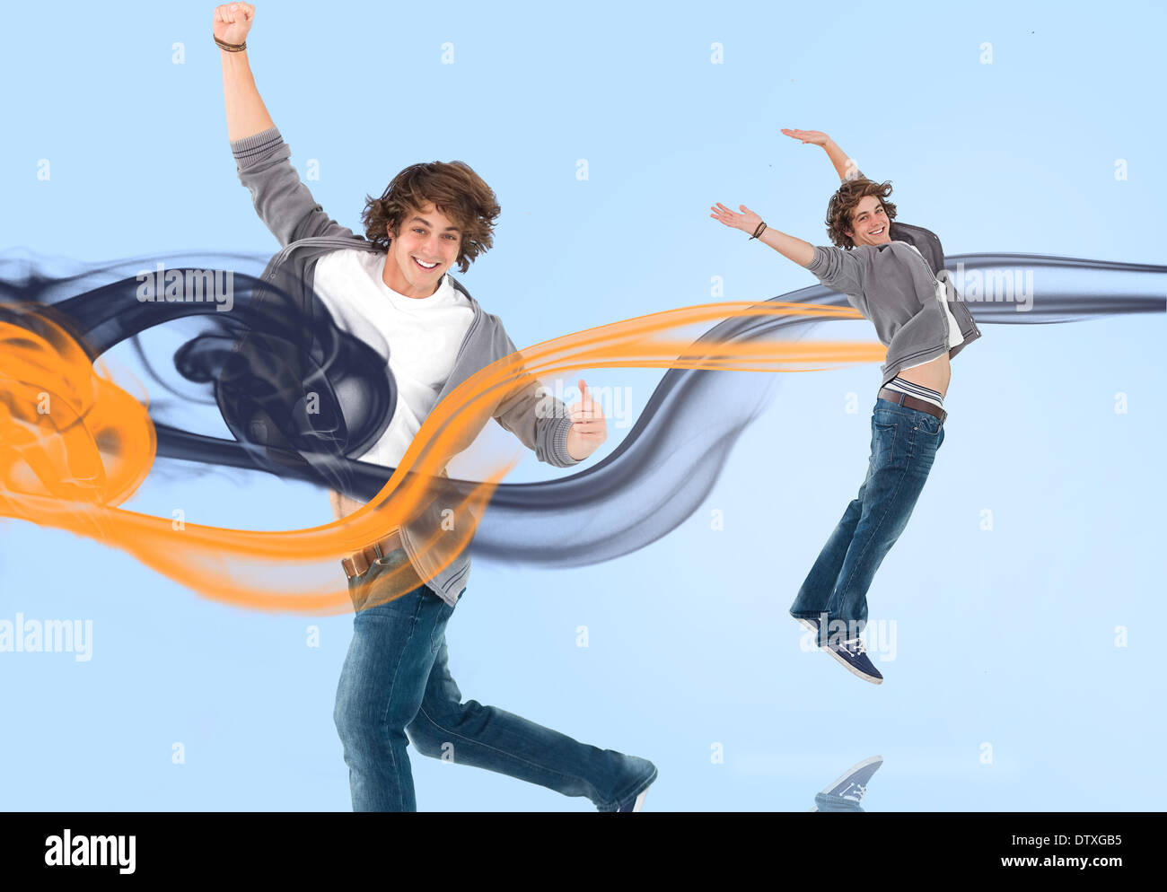 Two of the same young man jumping for joy Stock Photo - Alamy
