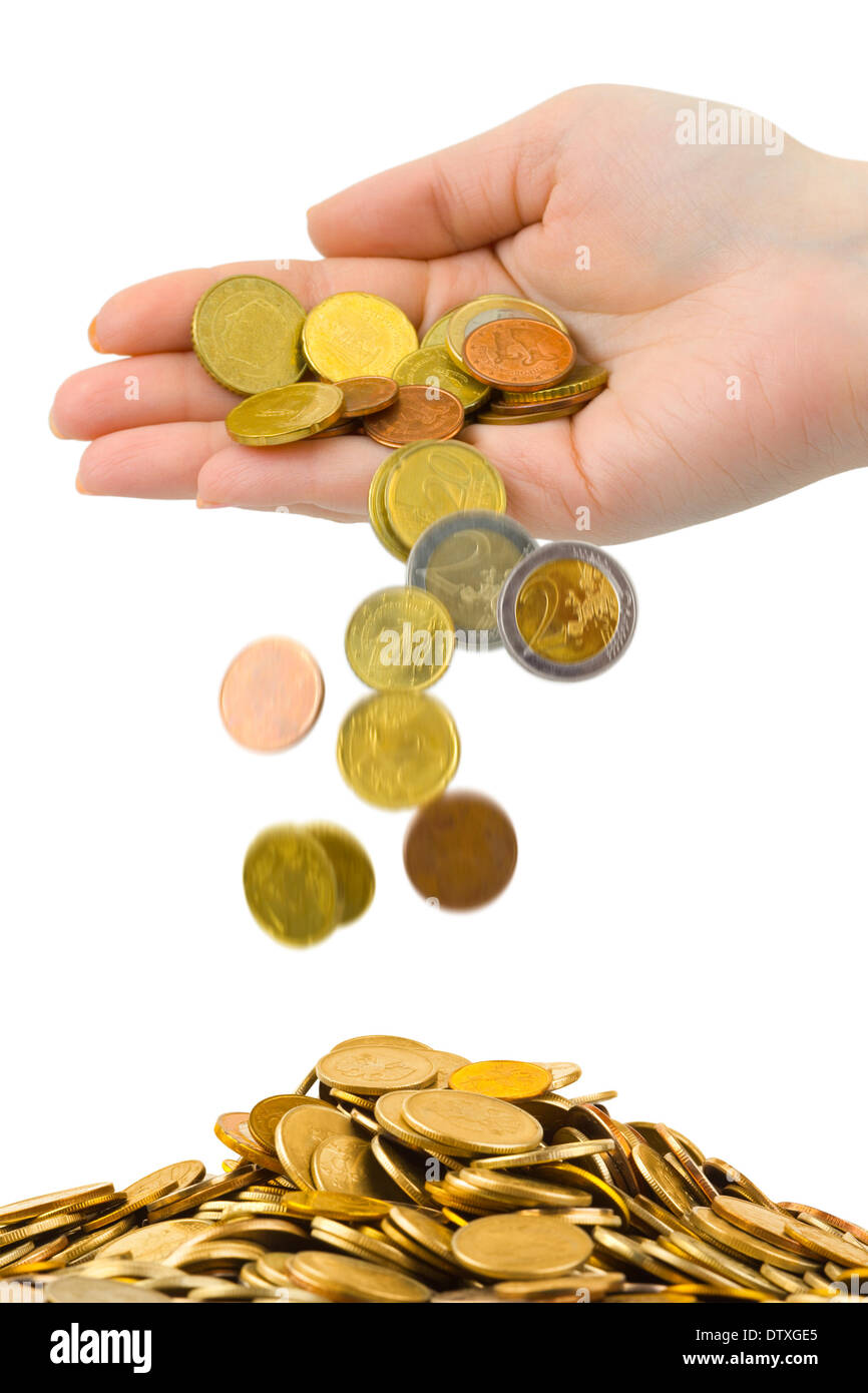 Hand and falling coins Stock Photo - Alamy