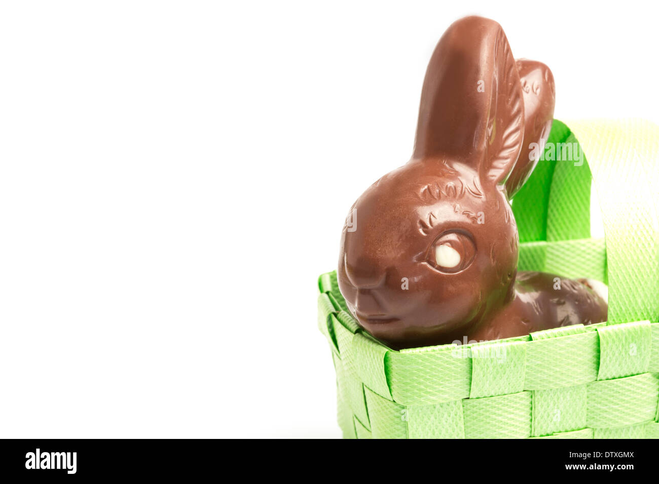 Chocolate bunny in a basket Stock Photo - Alamy