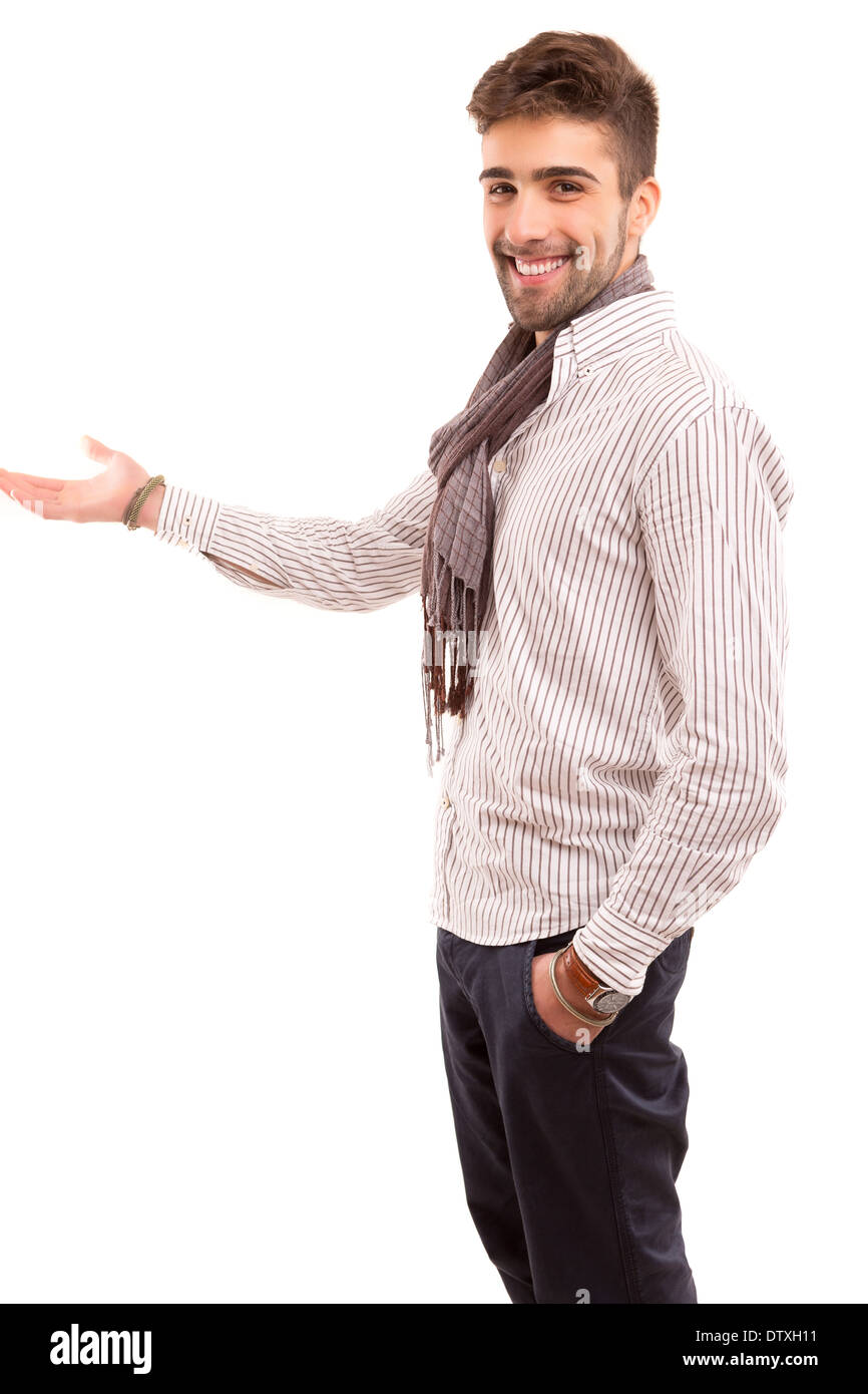 Young man presenting your product, isolated over a white background ...