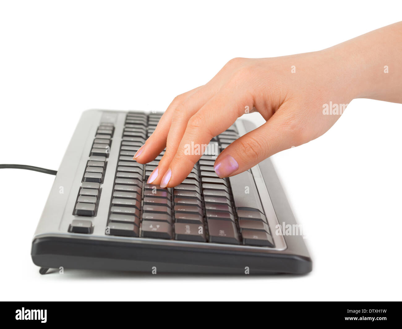 Computer keyboard and hand Stock Photo - Alamy
