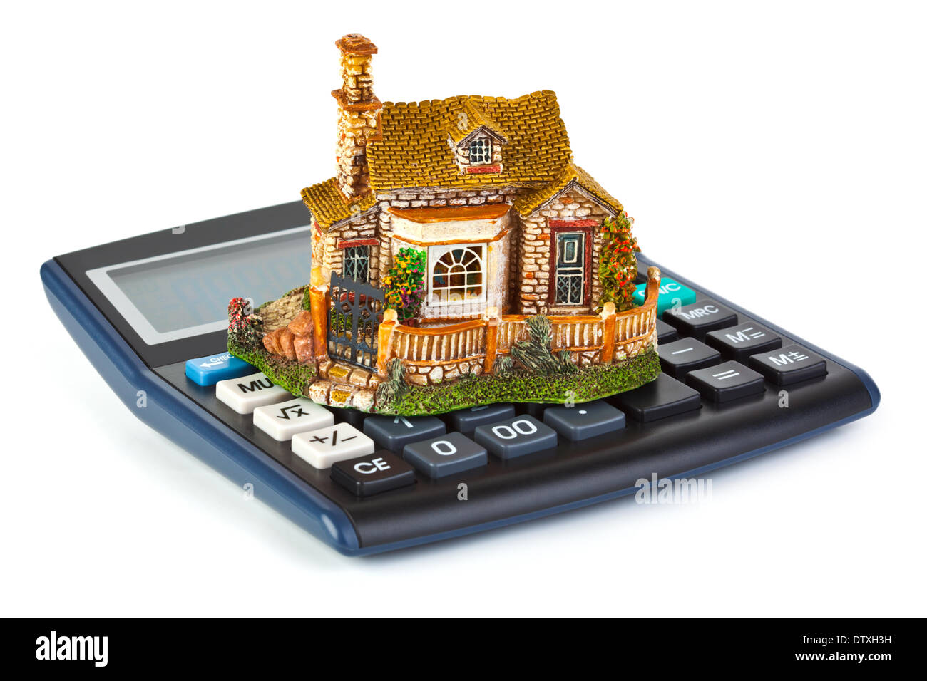 Calculator and house Stock Photo - Alamy