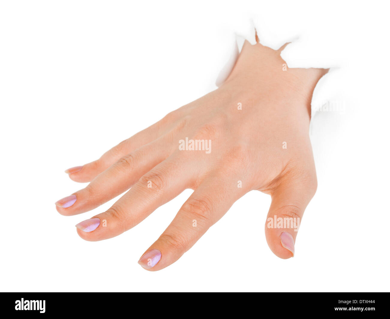 Hand punching thru paper Stock Photo - Alamy