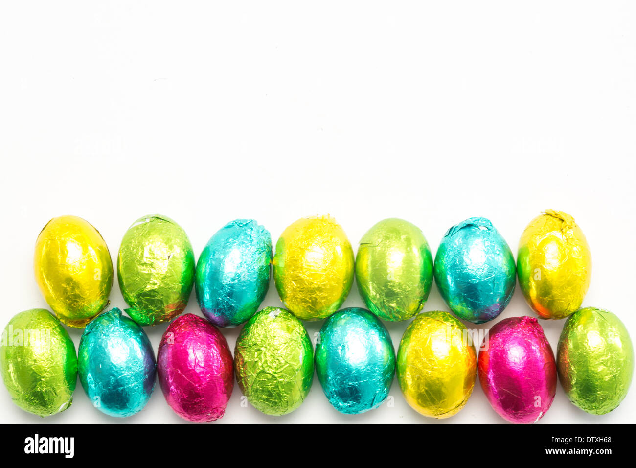 Colourful foil wrapped easter eggs Stock Photo - Alamy