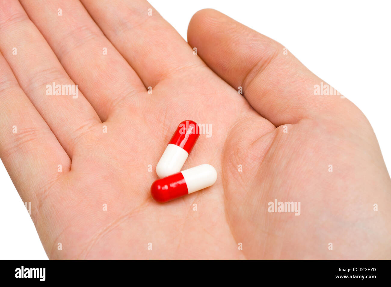 Hand and pills Stock Photo - Alamy