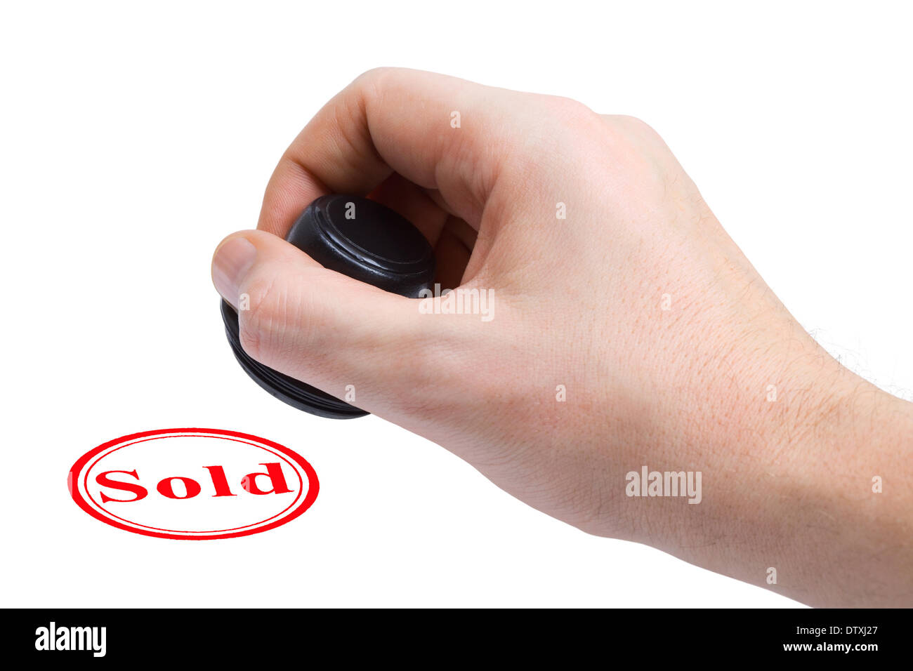 Hand and rubber stamp Sold Stock Photo - Alamy
