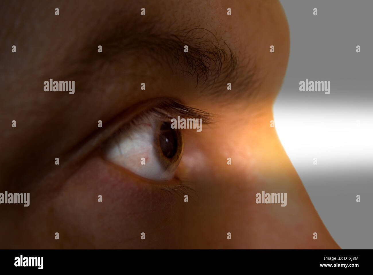 Eye and light beam Stock Photo - Alamy
