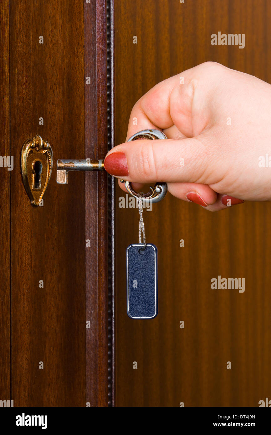 Close up hand turning key hi-res stock photography and images - Alamy