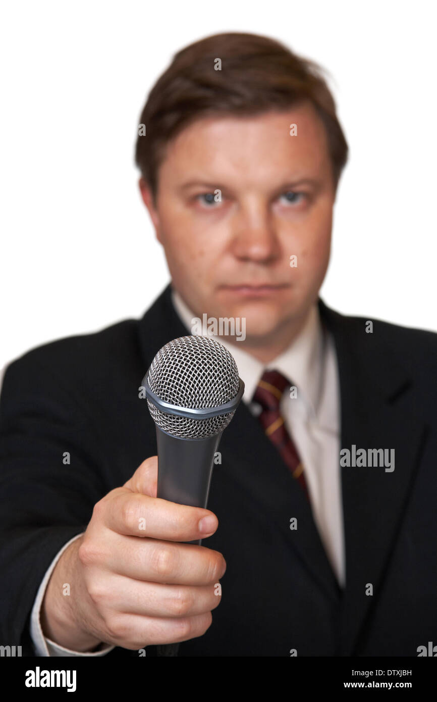 Journalist with microphone Stock Photo - Alamy