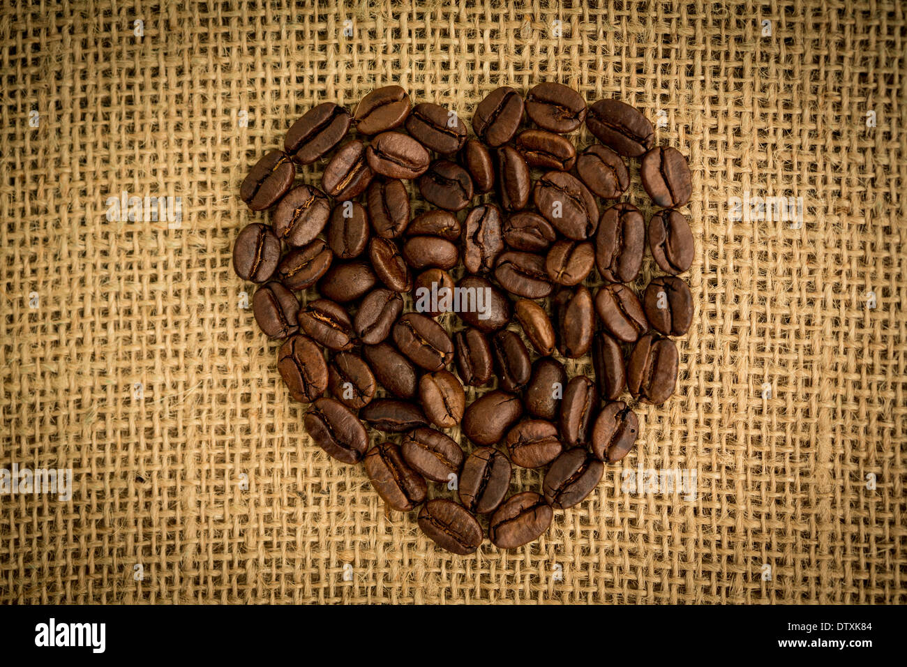 Heart made of coffee beans Stock Photo - Alamy