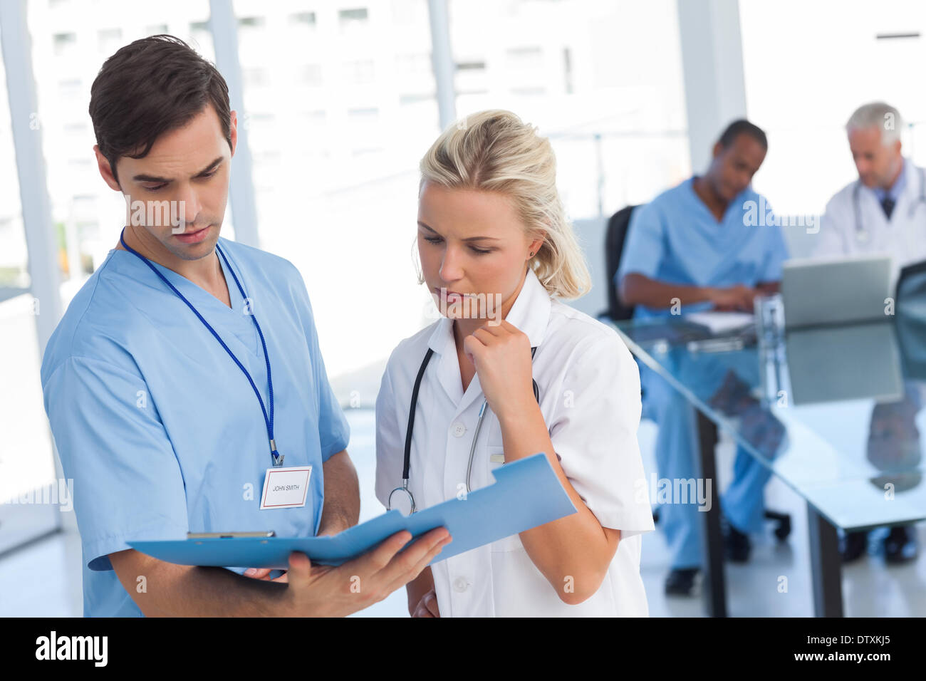 Two male doctors examining hi-res stock photography and images - Alamy