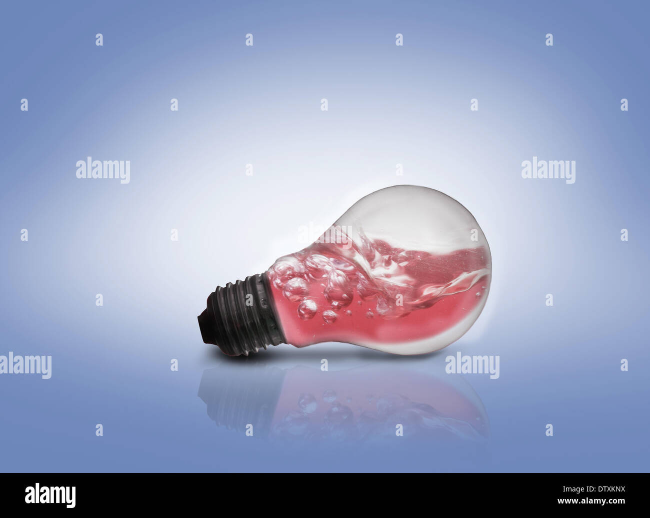 Light bulb with red water inside Stock Photo - Alamy