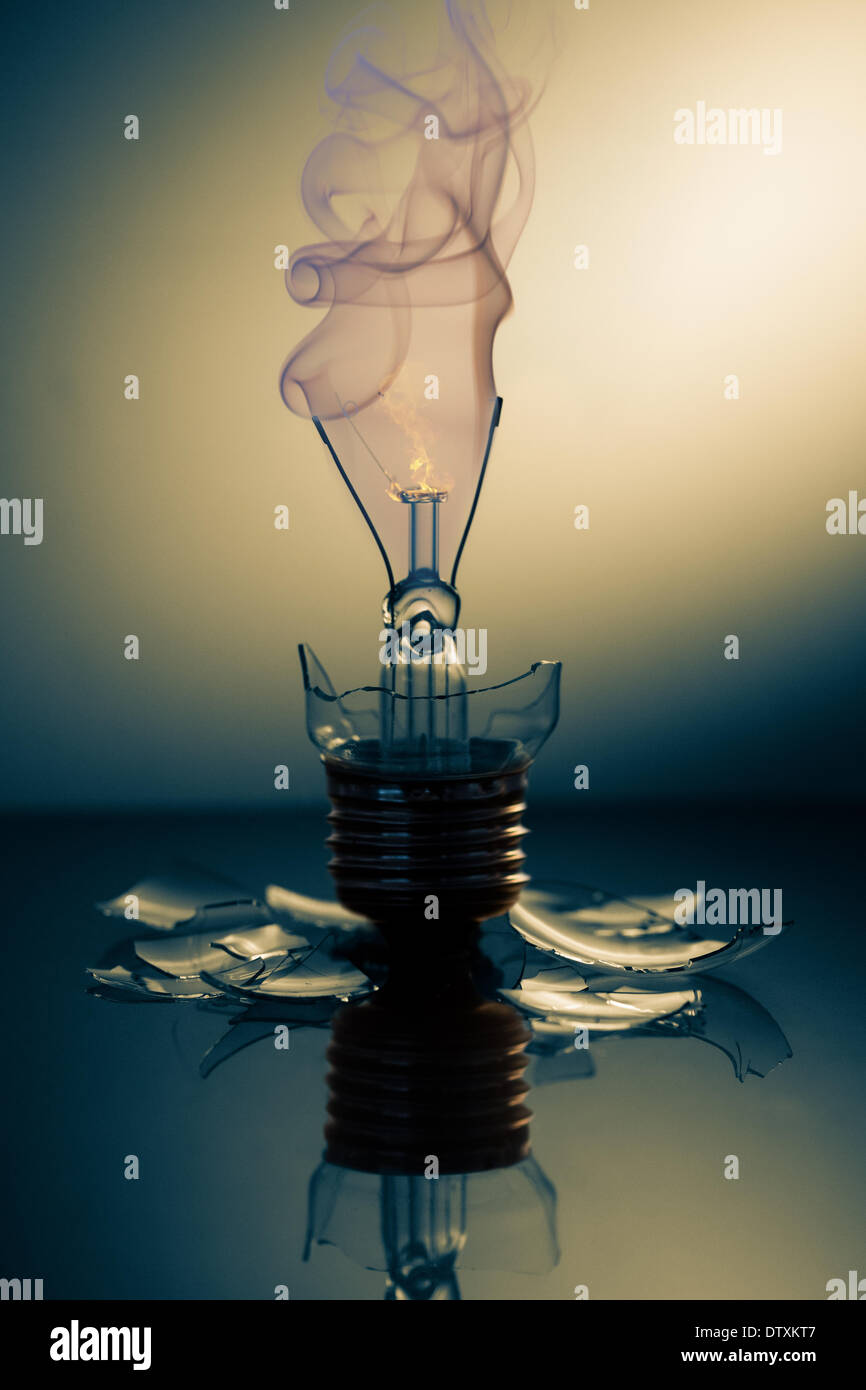 Broken light bulb Stock Photo - Alamy