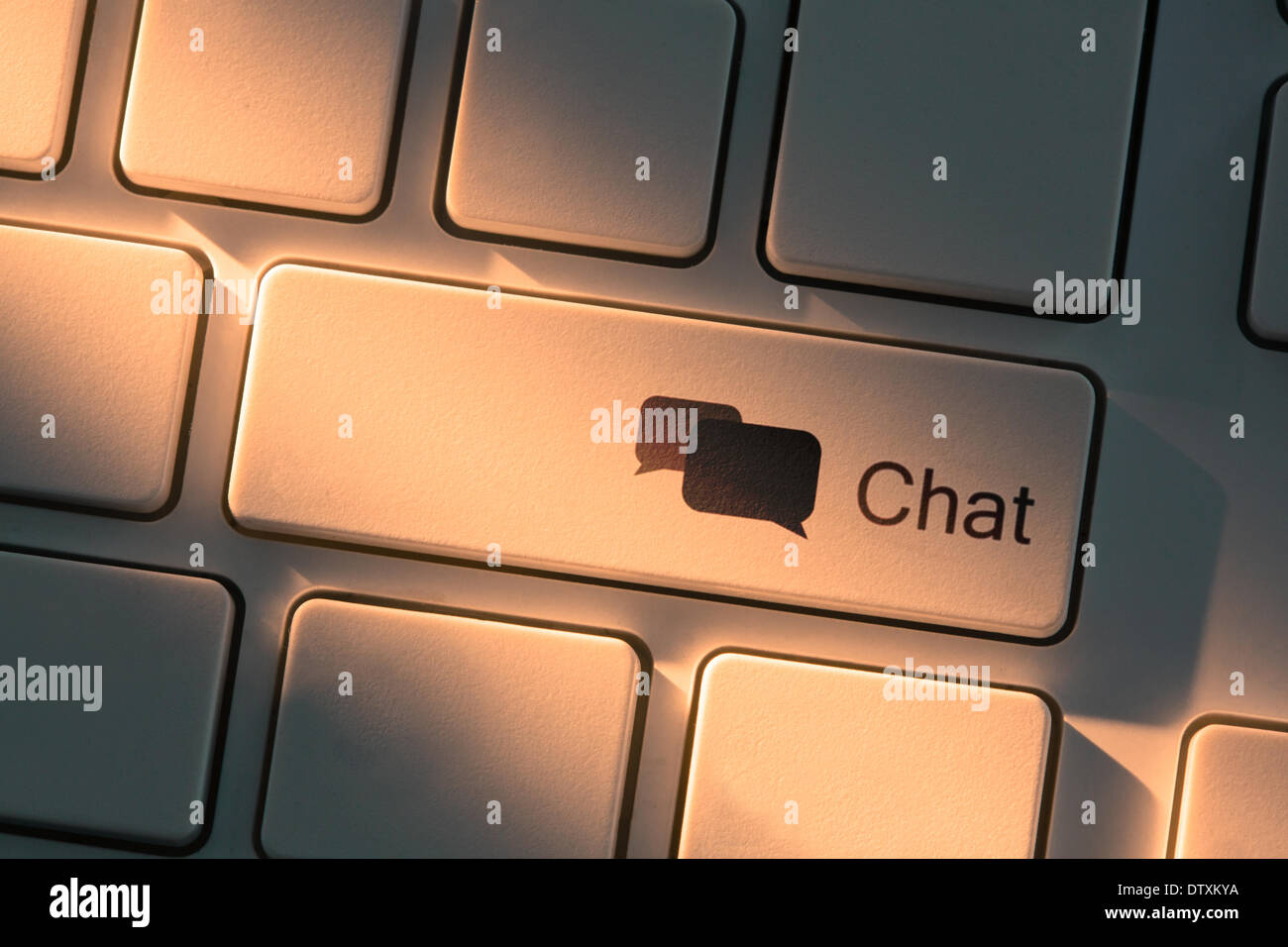 Keyboard with close up on chat button Stock Photo - Alamy