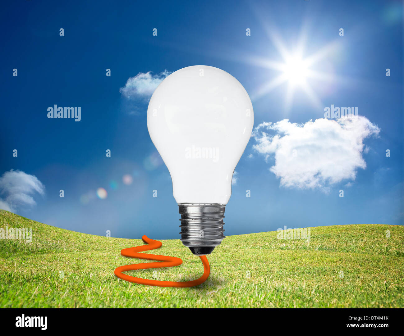Light bulb floating in a green field Stock Photo - Alamy
