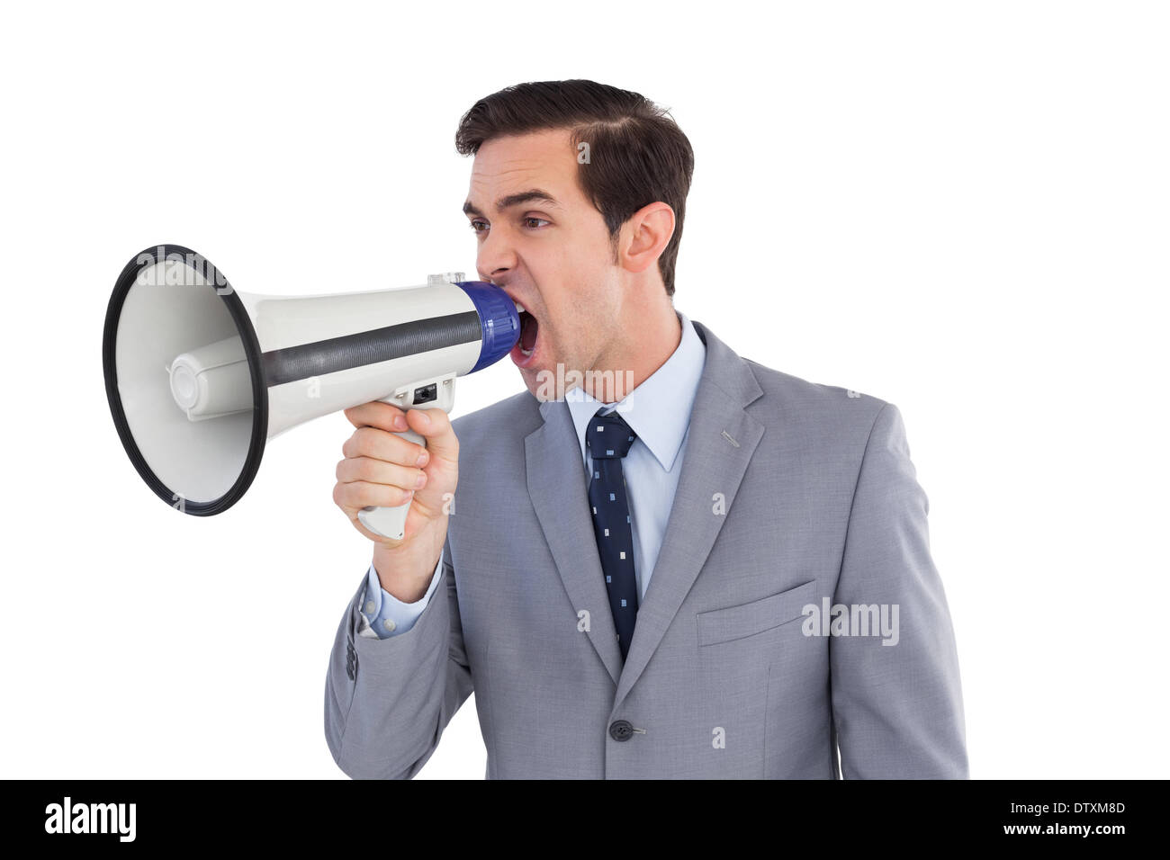Businessman yelling into a megaphone Stock Photo - Alamy