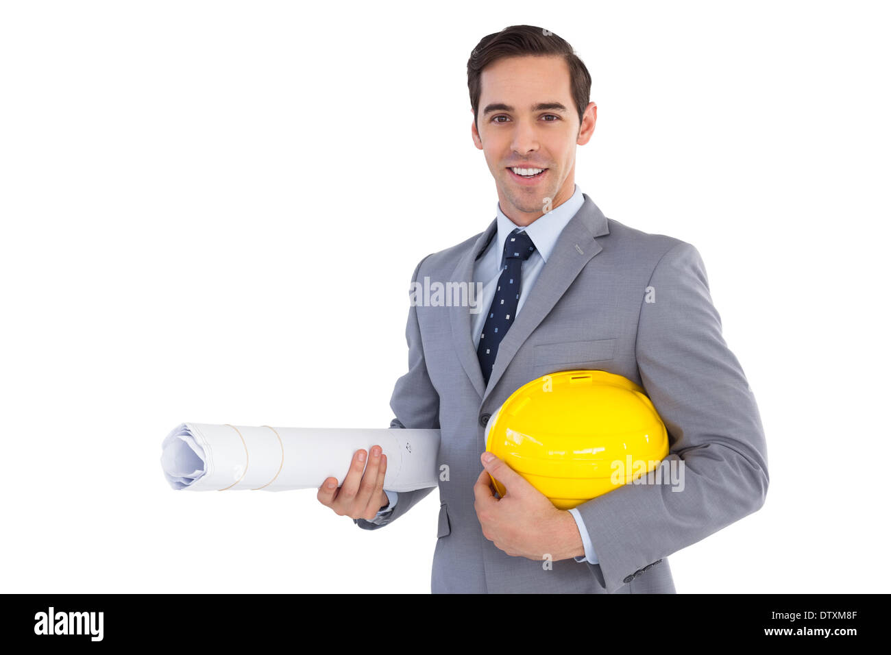 Smiling architect holding plans and hard hat Stock Photo - Alamy Smiling architect holding plans and hard hat Stock Photo - Alamy