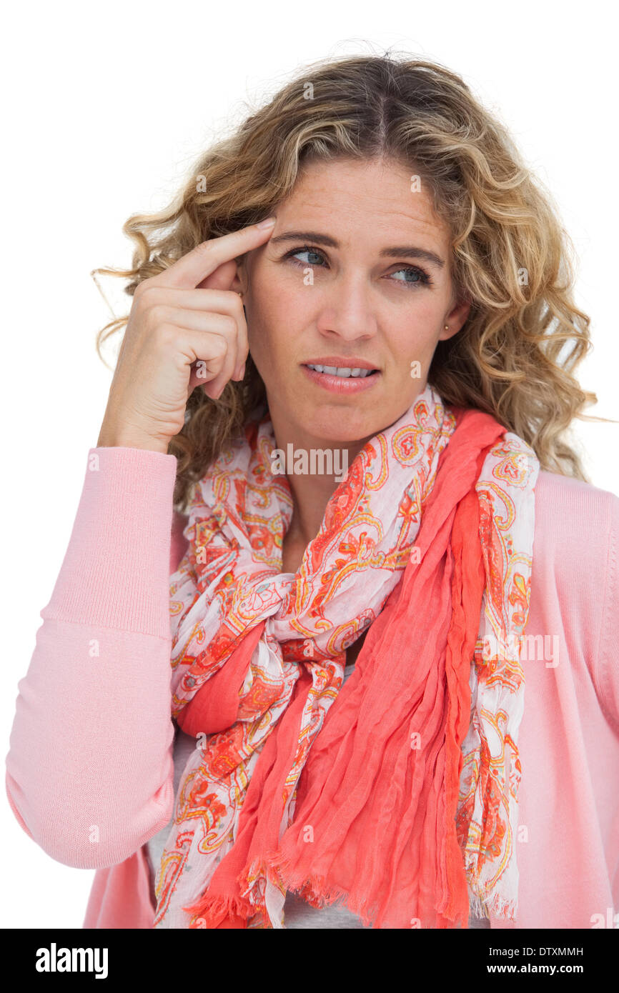 beautiful casual woman touching her temple. Isolated on white Stock ...