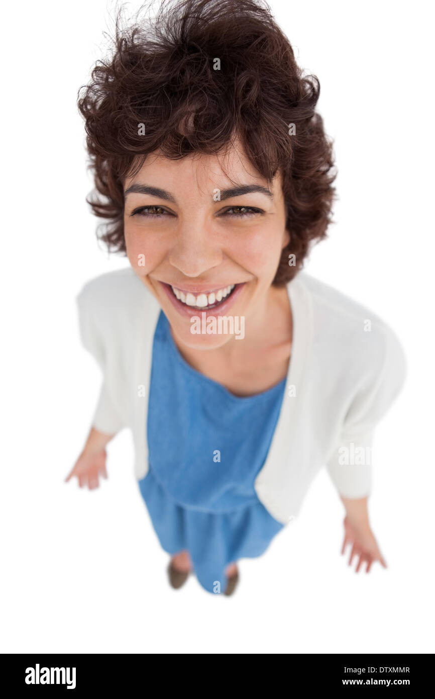 Overhead of cheerful woman standing alone Stock Photo - Alamy