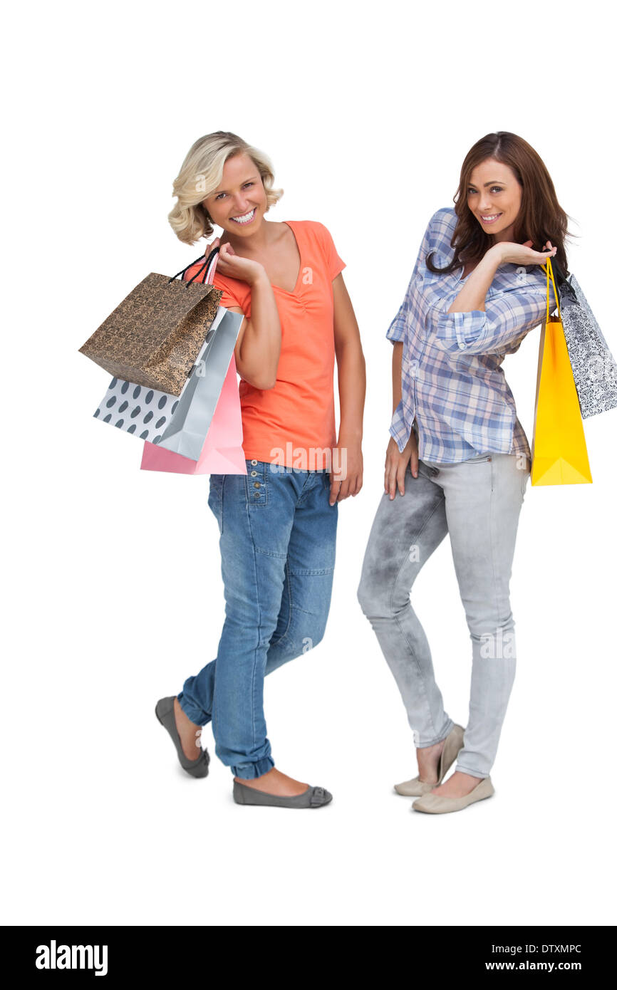 Women doing shopping and holding bags Stock Photo - Alamy