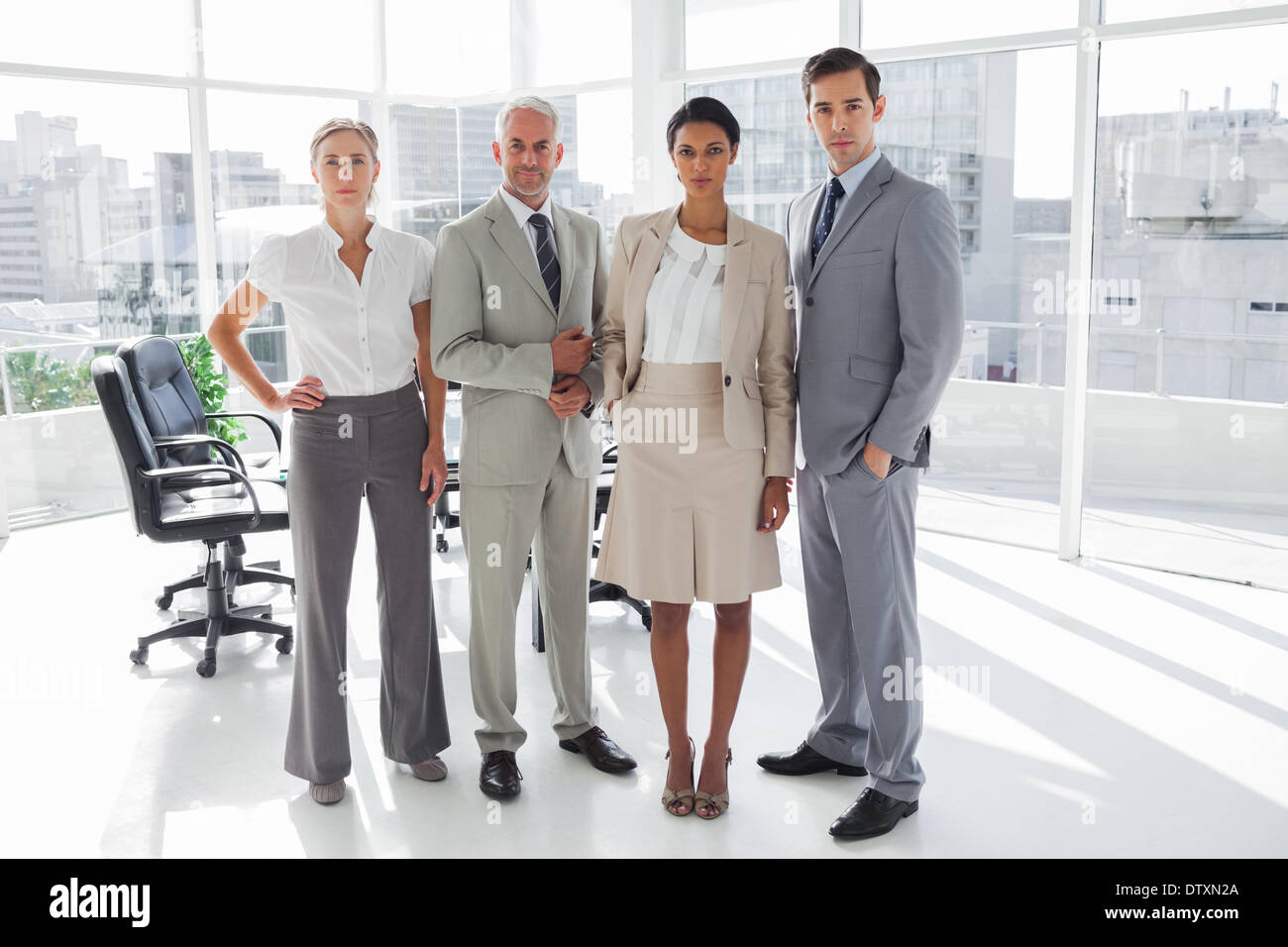 Business people standing in line Stock Photo - Alamy