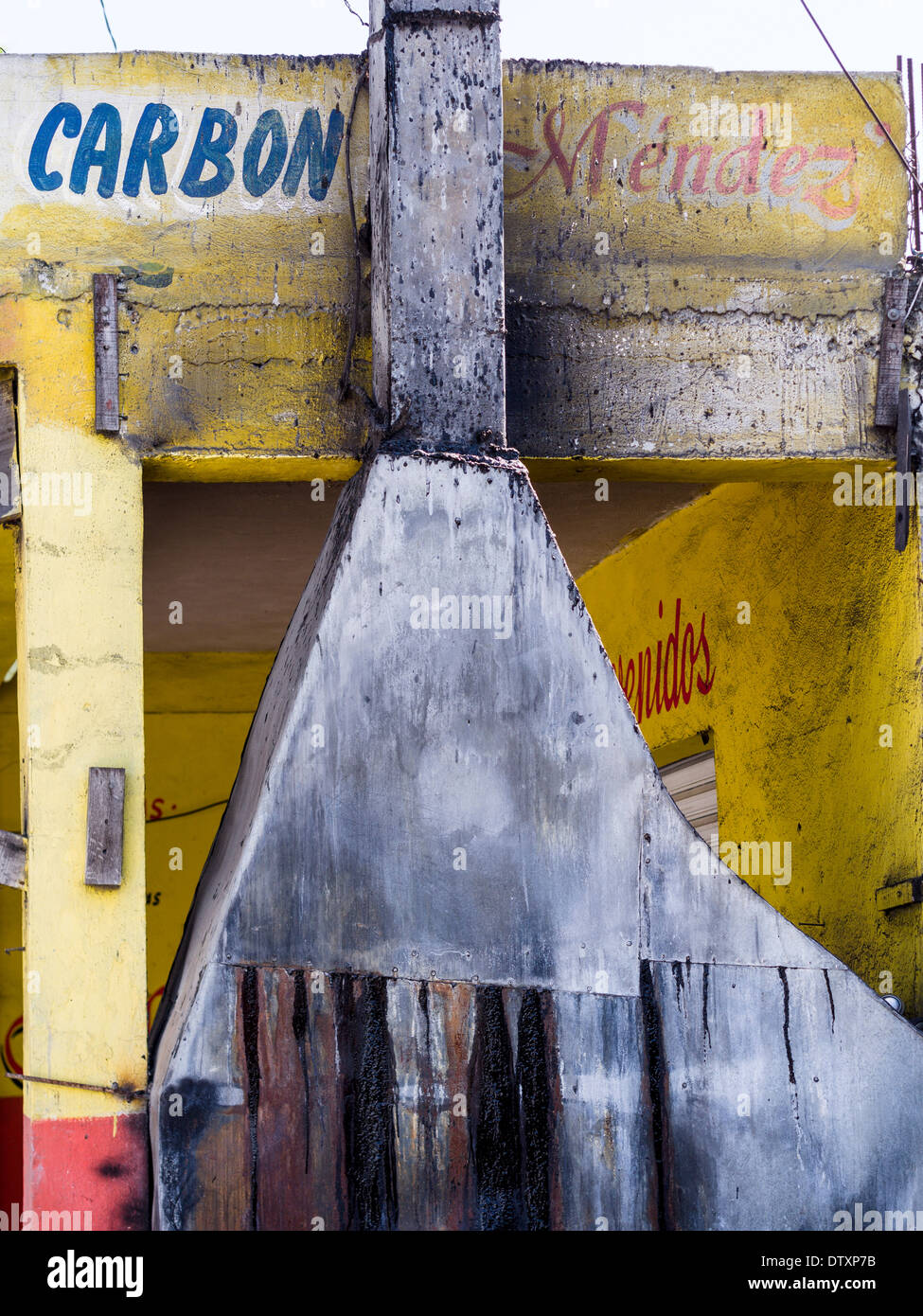 Grilled chicken chimney. Black grease drips from the sheet metal ...