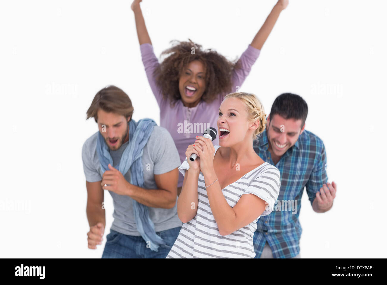 Excited group at karaoke Stock Photo - Alamy