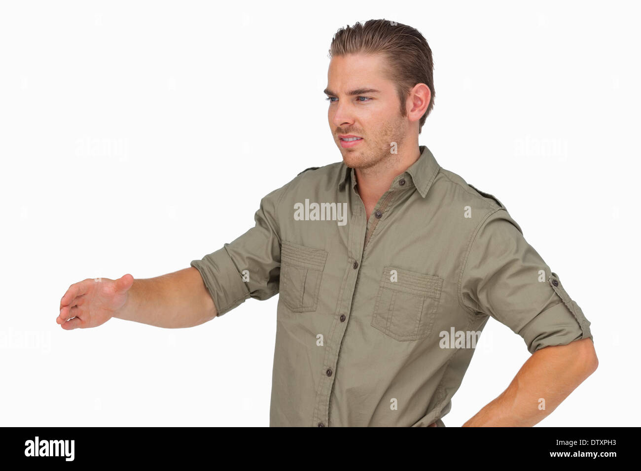 Man holding arm out for handshake Stock Photo - Alamy