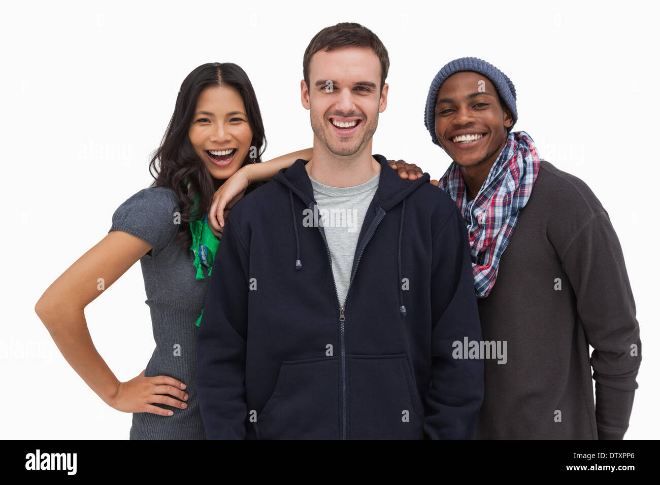 Stylish young friends smiling at camera Stock Photo - Alamy