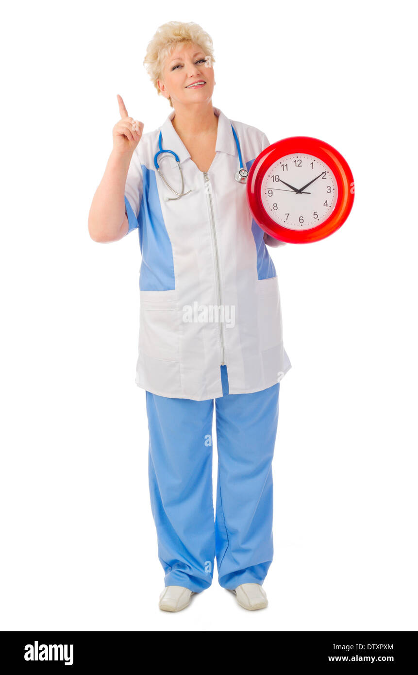 Mature doctor with clock isolated Stock Photo - Alamy
