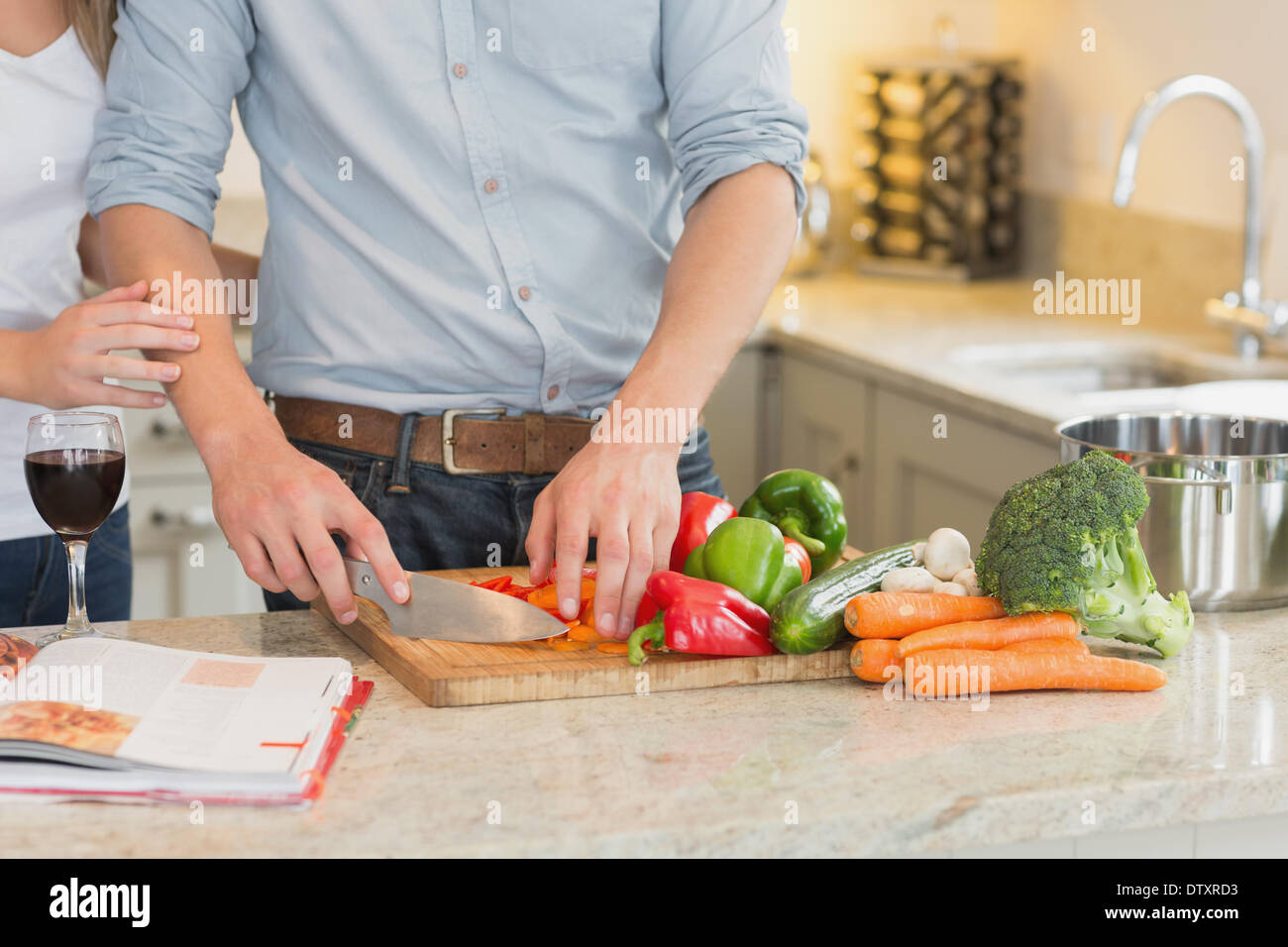 Man cutting vegetables Stock Photo - Alamy