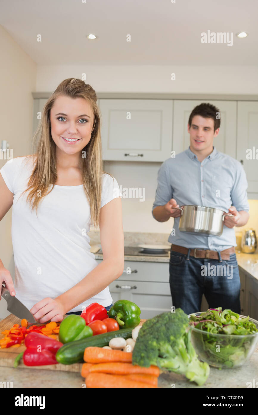 Couple cooking together Stock Photo - Alamy