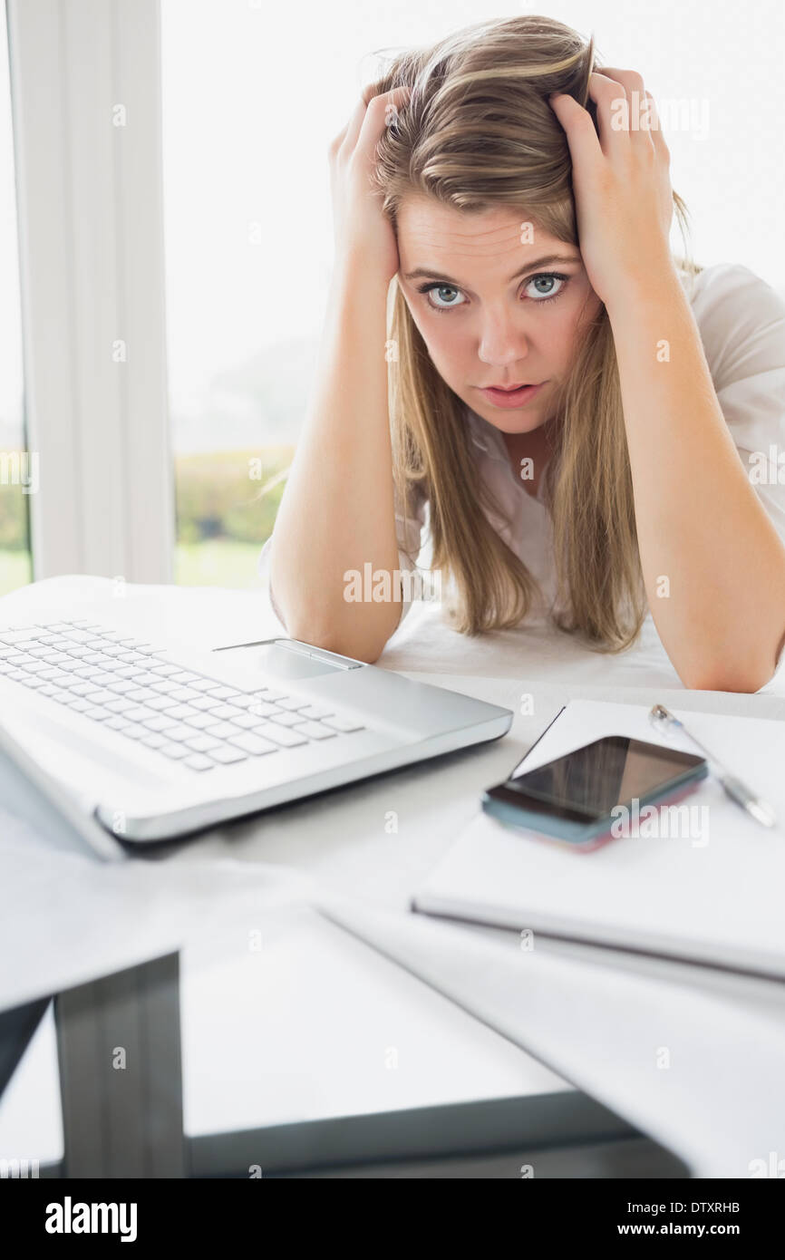 Businesswoman getting stressed Stock Photo - Alamy