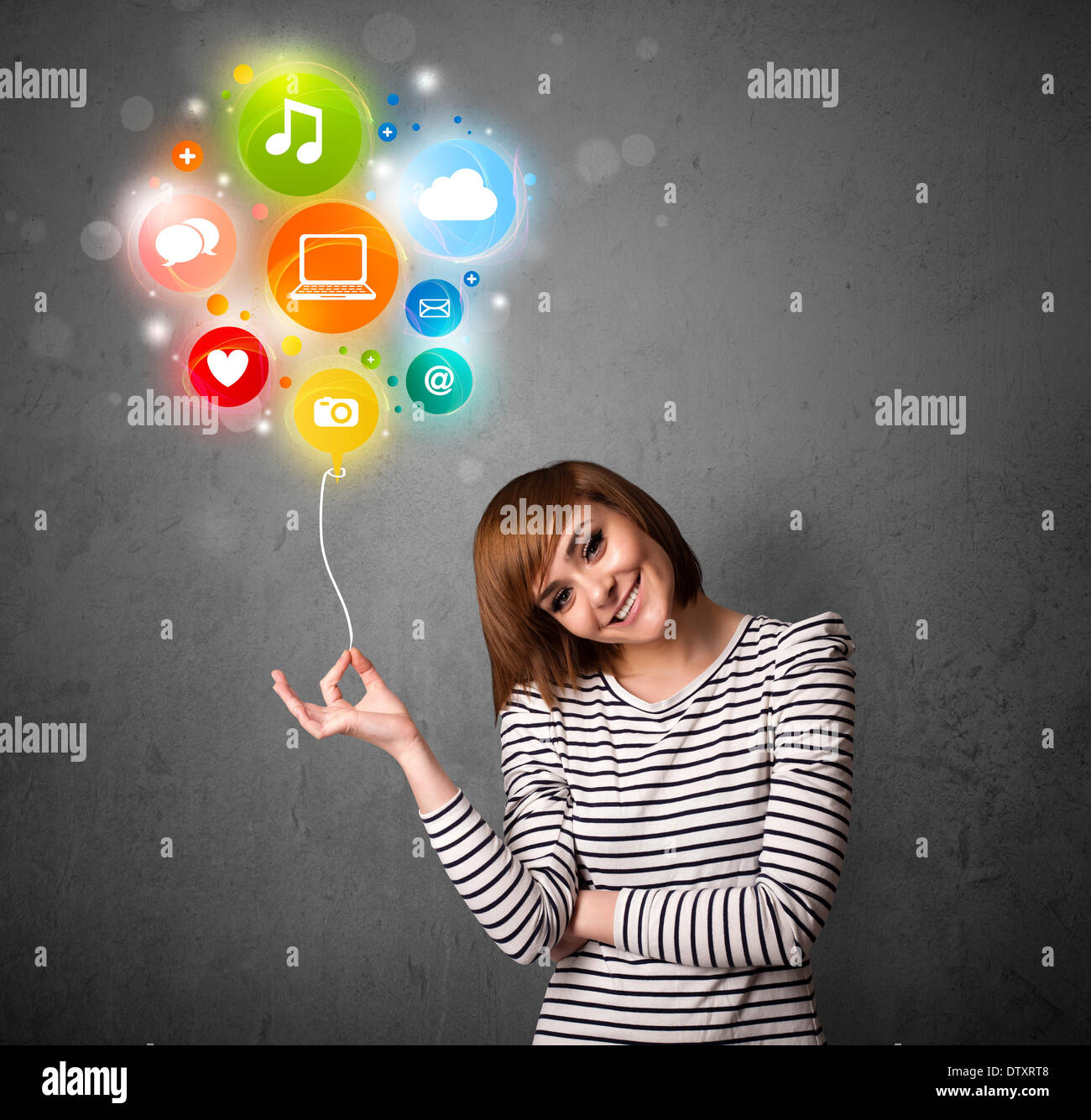 Woman holding social media balloon Stock Photo - Alamy