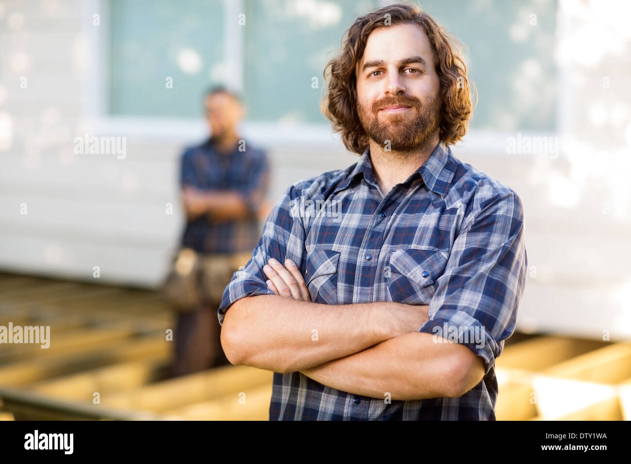 Man construction worker hands crossed hi-res stock photography and ...
