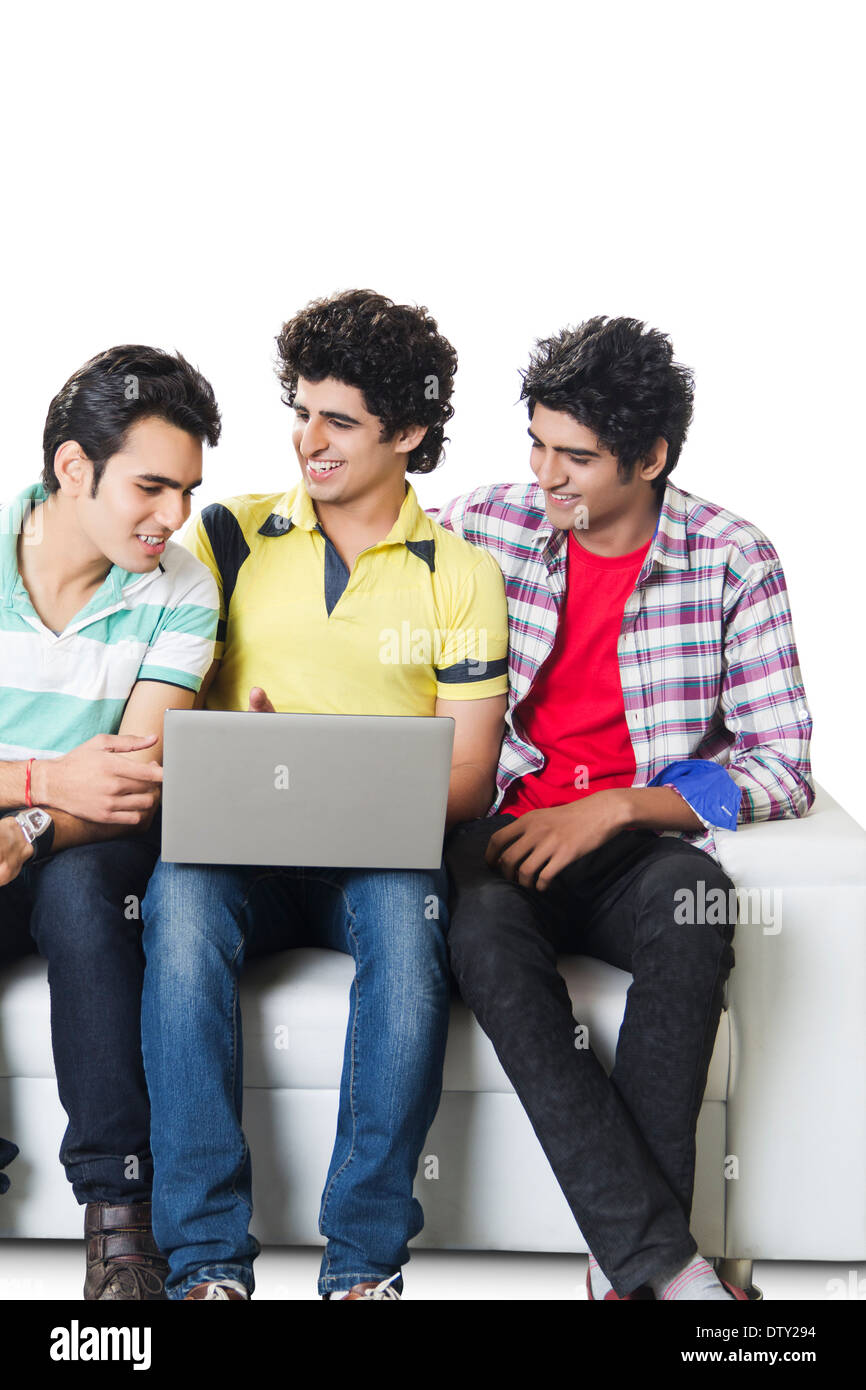 friend sitting with laptop and working Stock Photo - Alamy