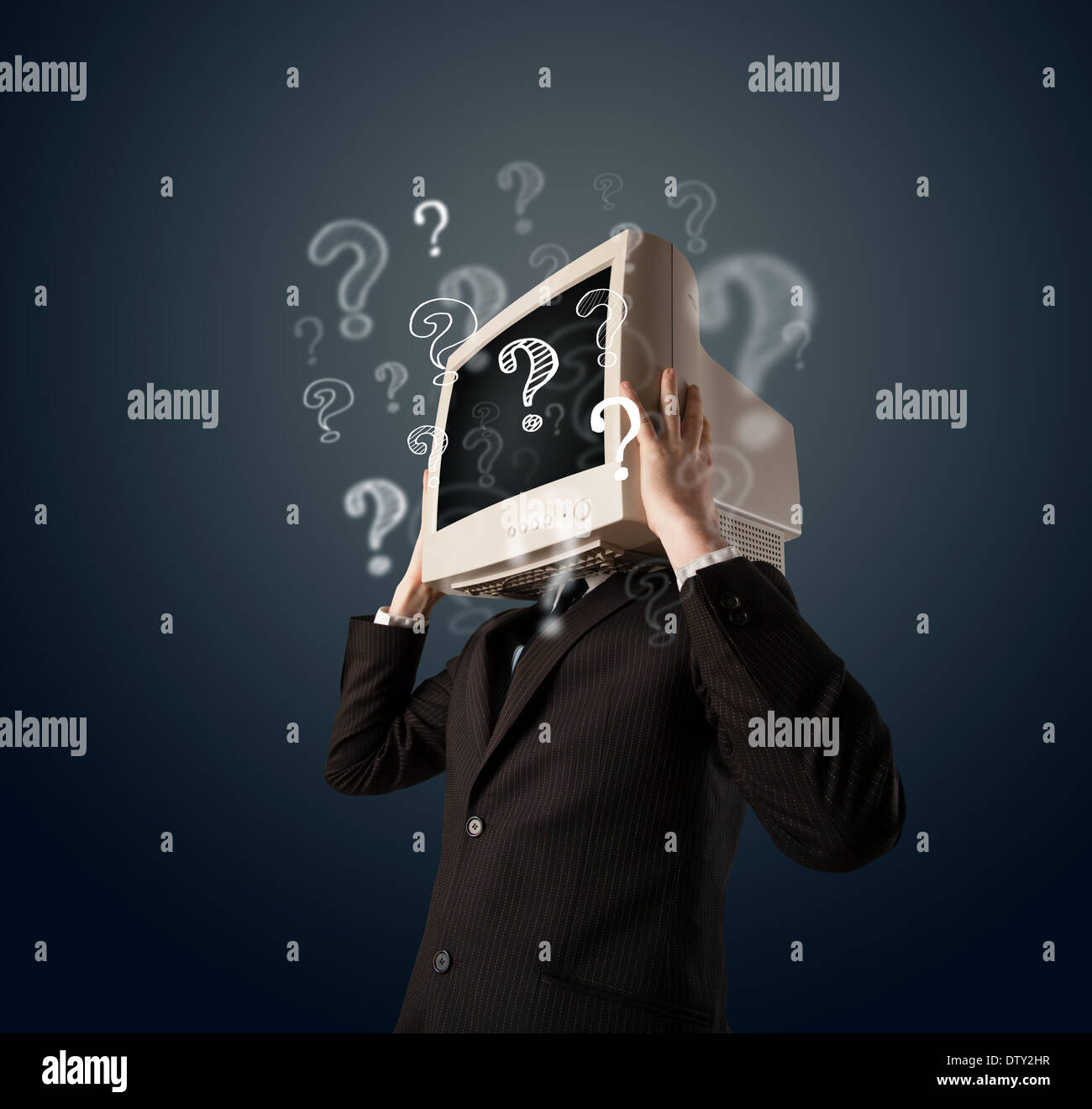Businessman with a computer monitor head and question marks Stock Photo ...