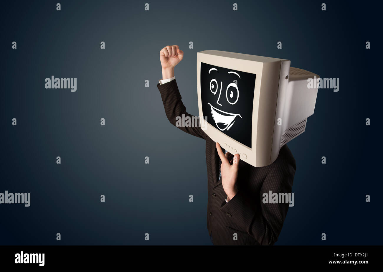 Happy businessman with a PC monitor head and a smiley face Stock Photo ...