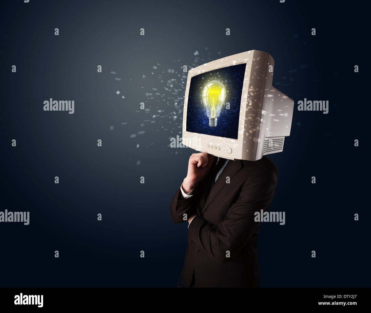 Business man with a pc monitor head and idea light bulb in the display ...