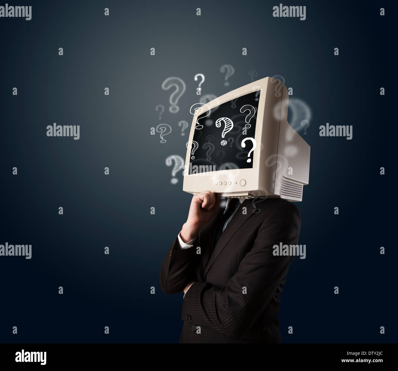 Businessman with a computer monitor head and question marks Stock Photo ...