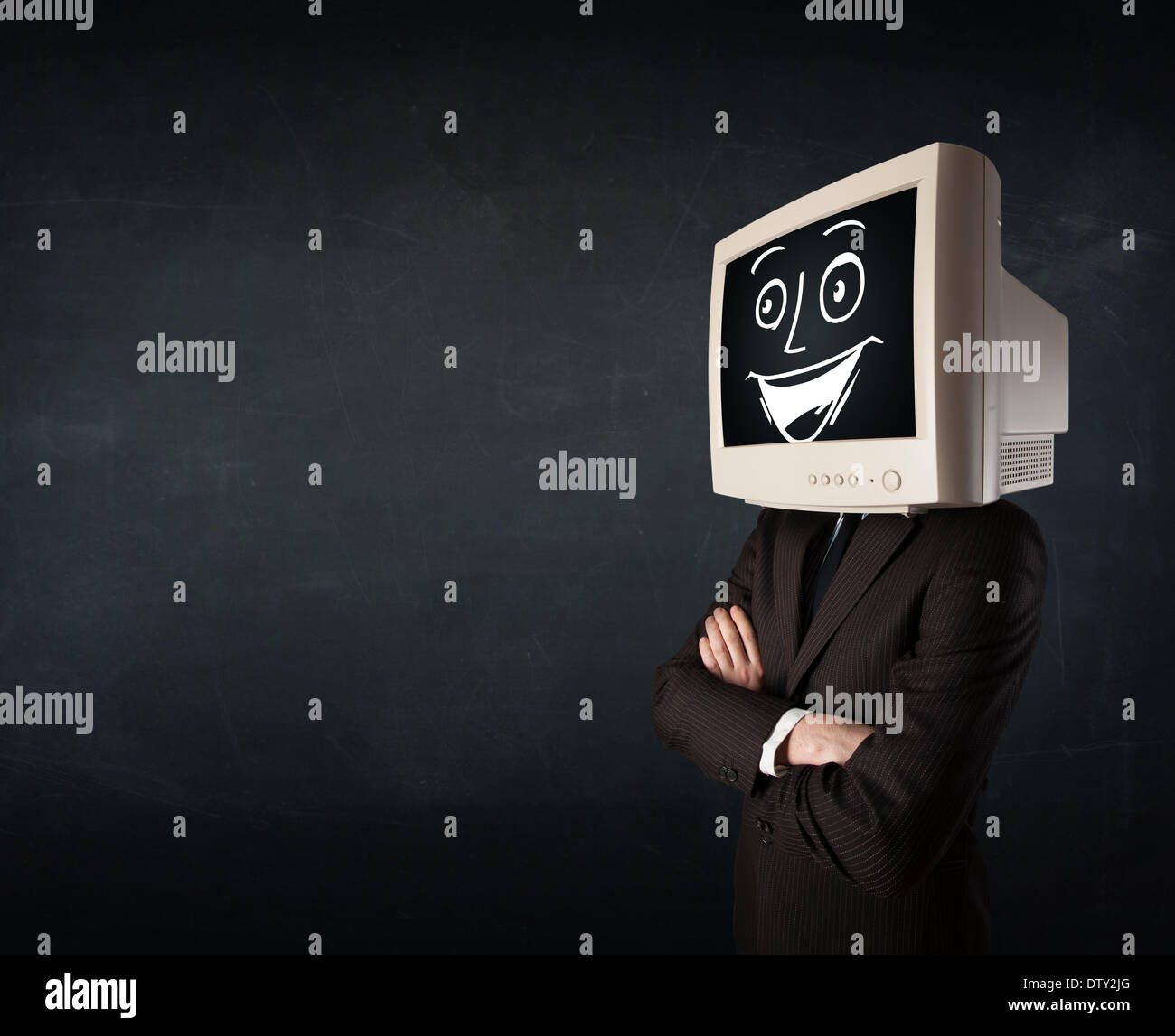 Happy businessman with a PC monitor head and a smiley face Stock Photo ...