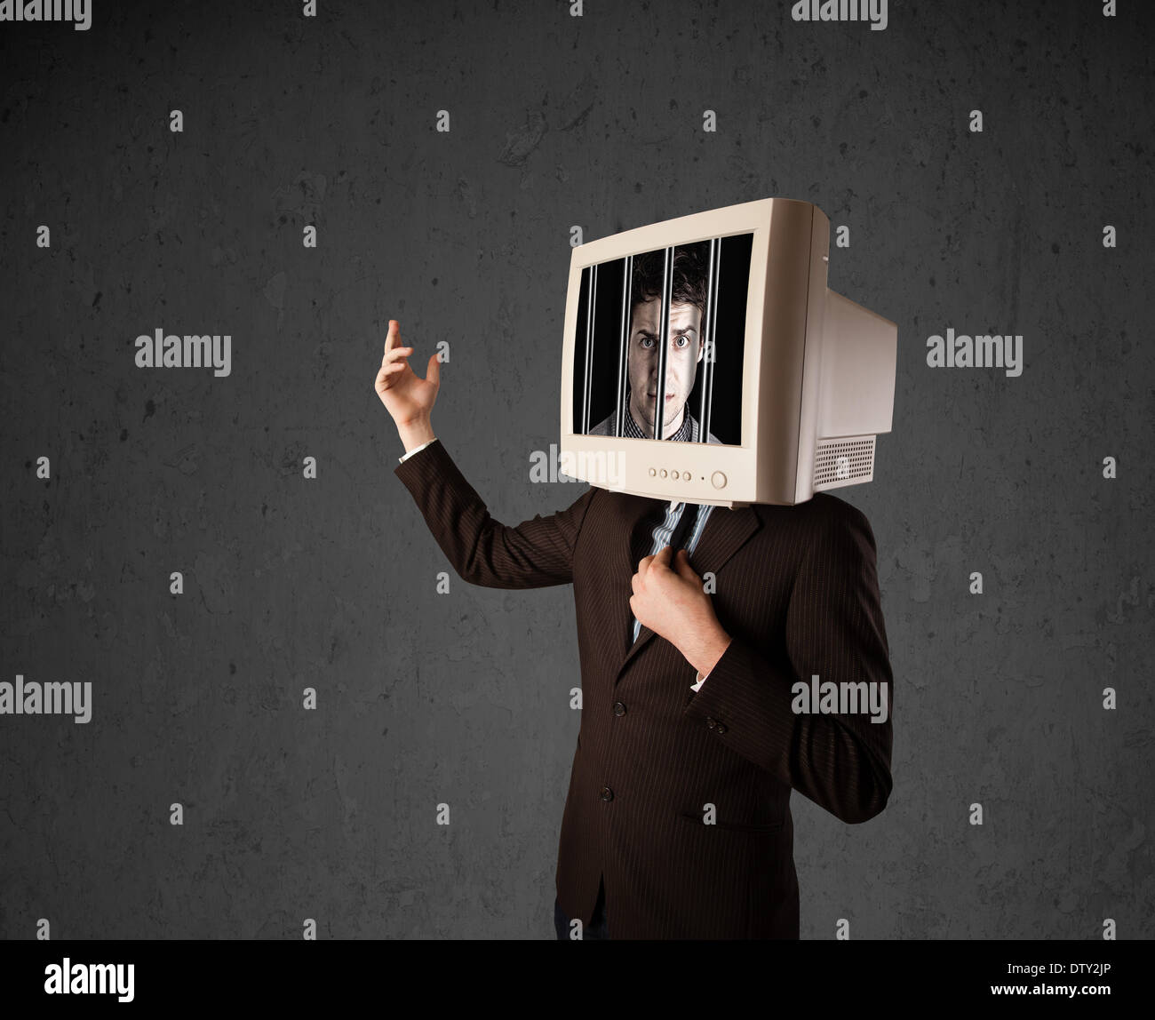 Business man with monitor on his head traped into a digital system ...