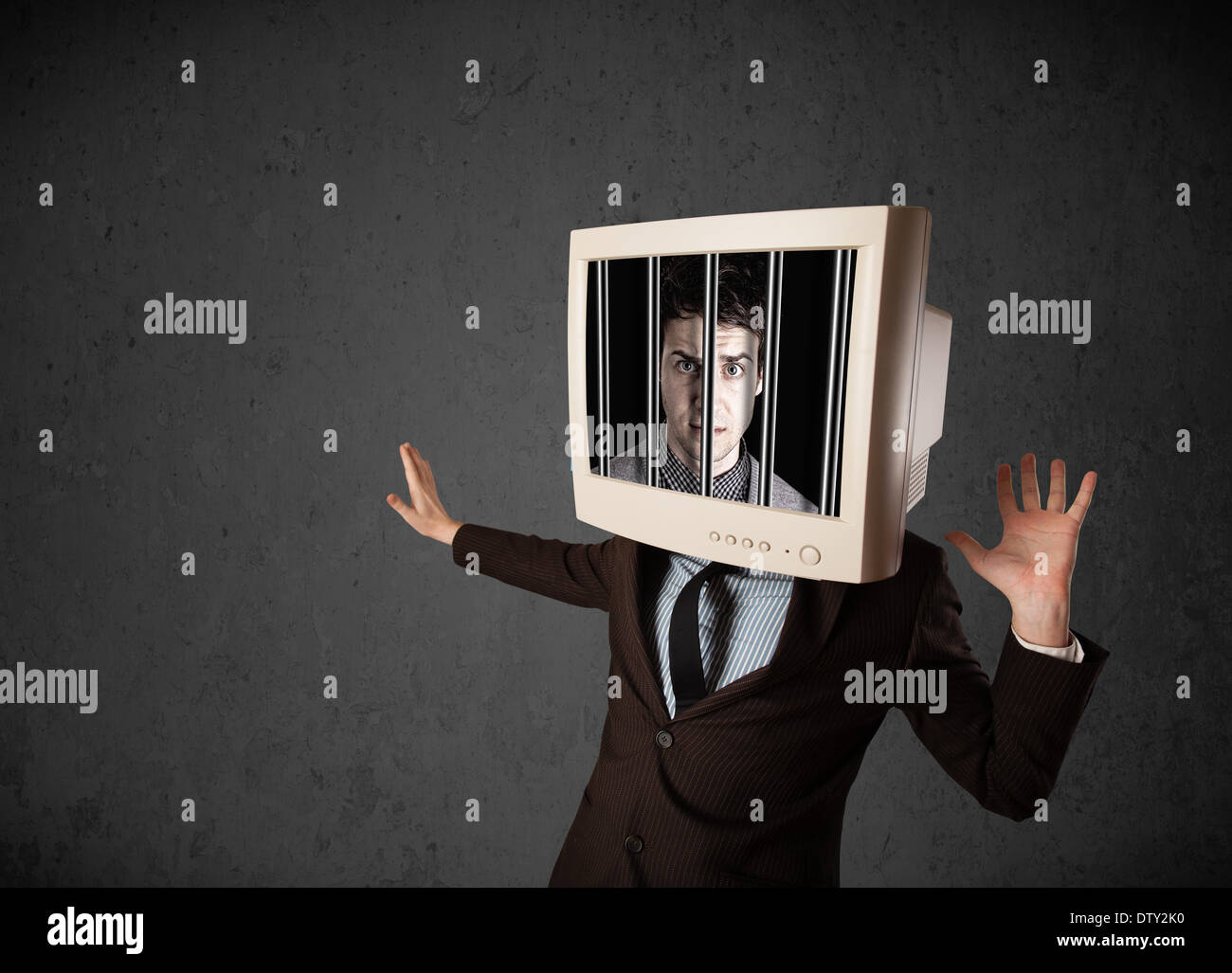 Business man with monitor on his head traped into a digital system ...