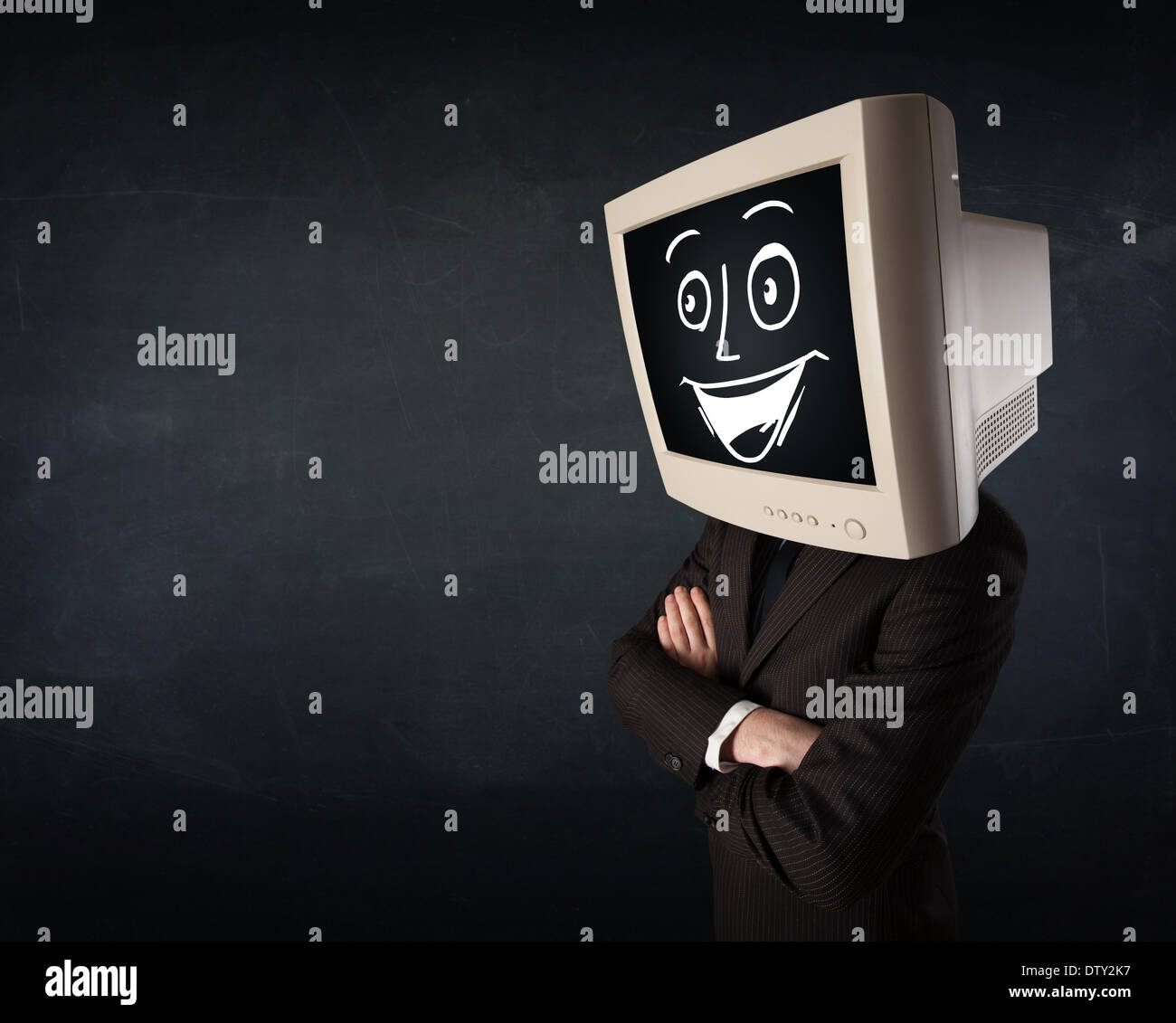 Happy businessman with a PC monitor head and a smiley face Stock Photo ...
