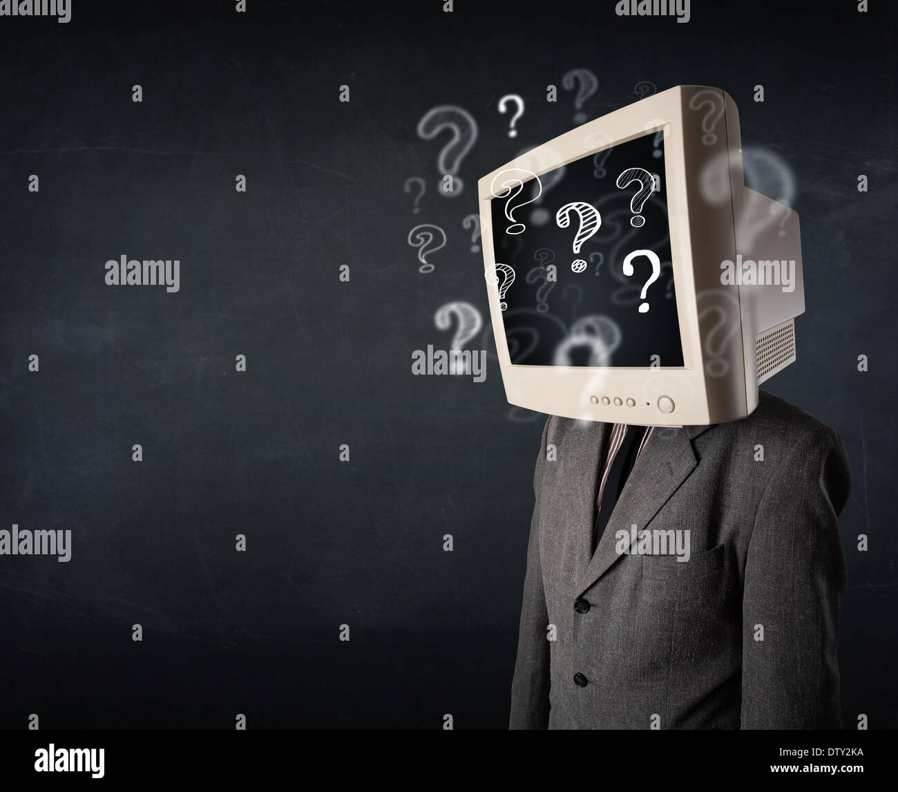 Businessman with a computer monitor head and question marks Stock Photo ...