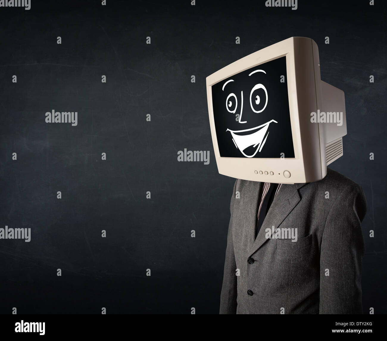 Happy businessman with a PC monitor head and a smiley face Stock Photo ...