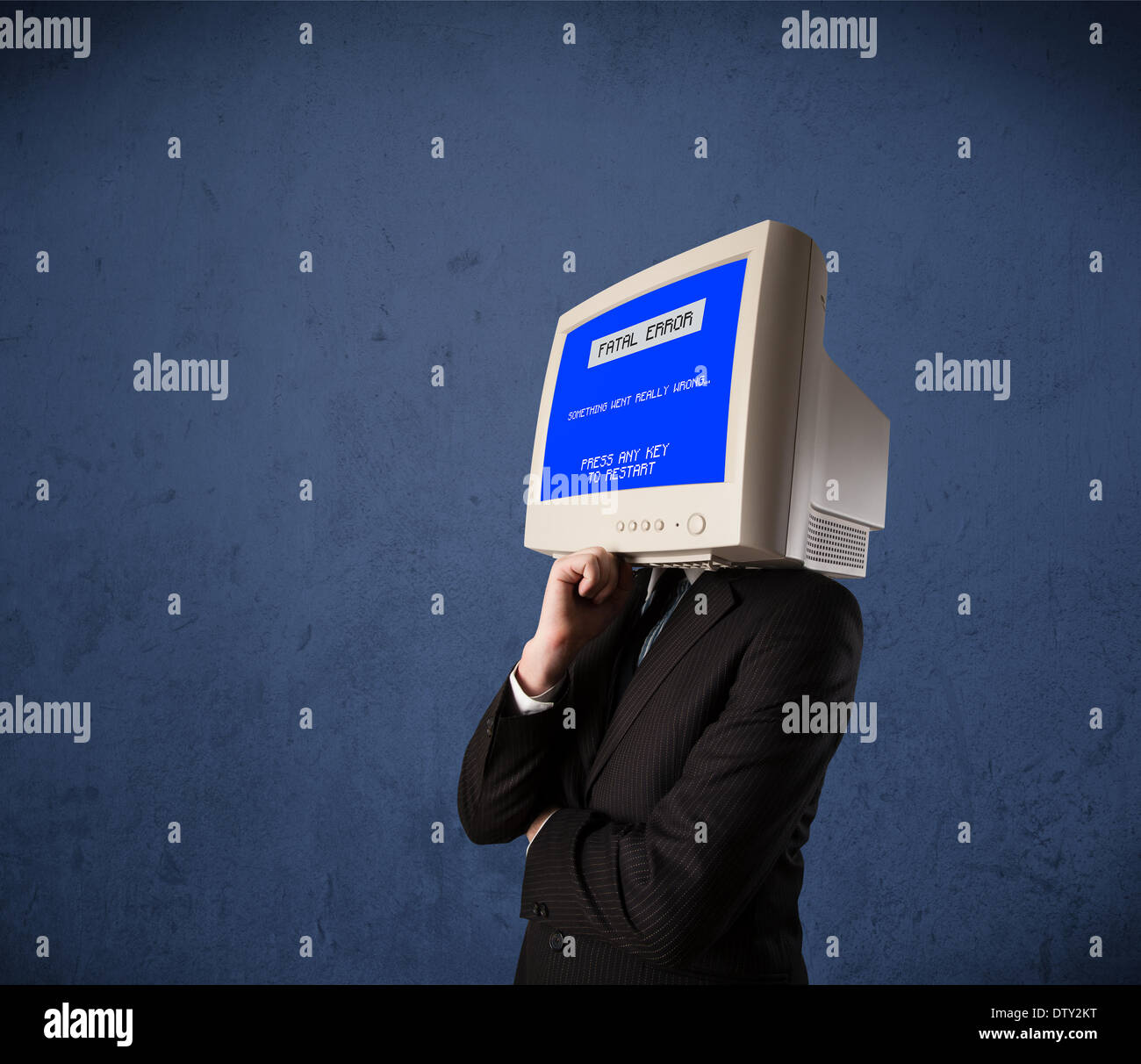 Person with a monitor head and fatal error blue screen on the display ...
