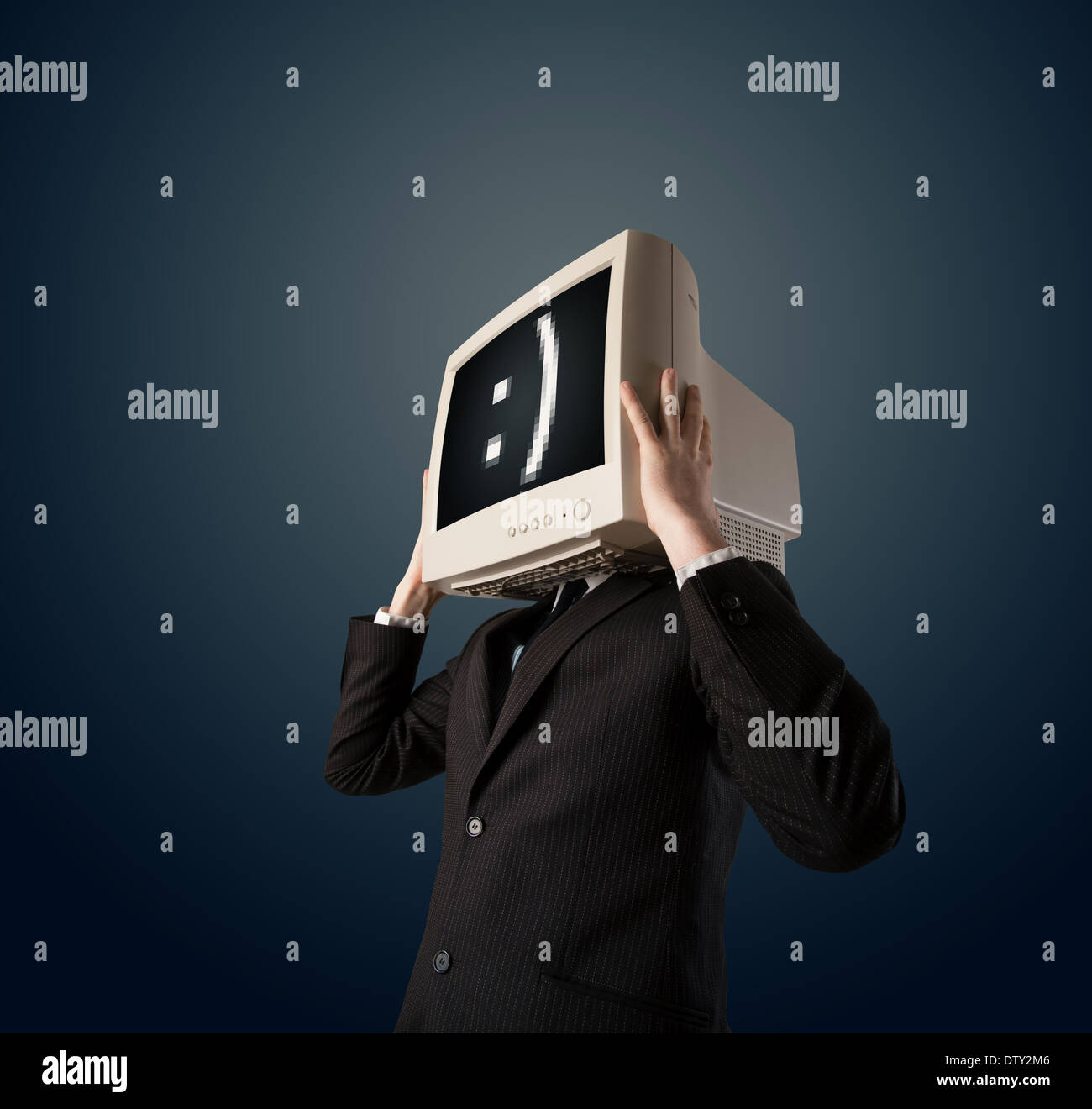 Funny young businessman with a monitor on his head and smiley on the ...