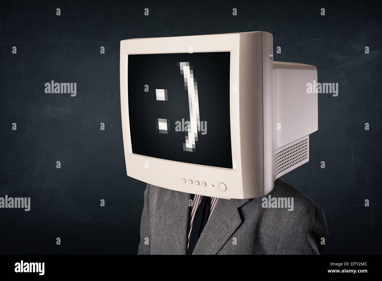 Funny young businessman with a monitor on his head and smiley on the ...