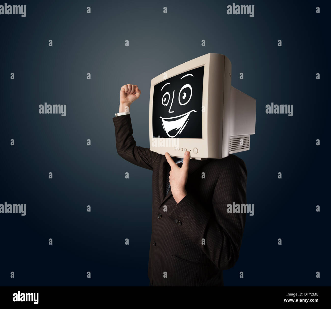 Happy businessman with a PC monitor head and a smiley face Stock Photo ...